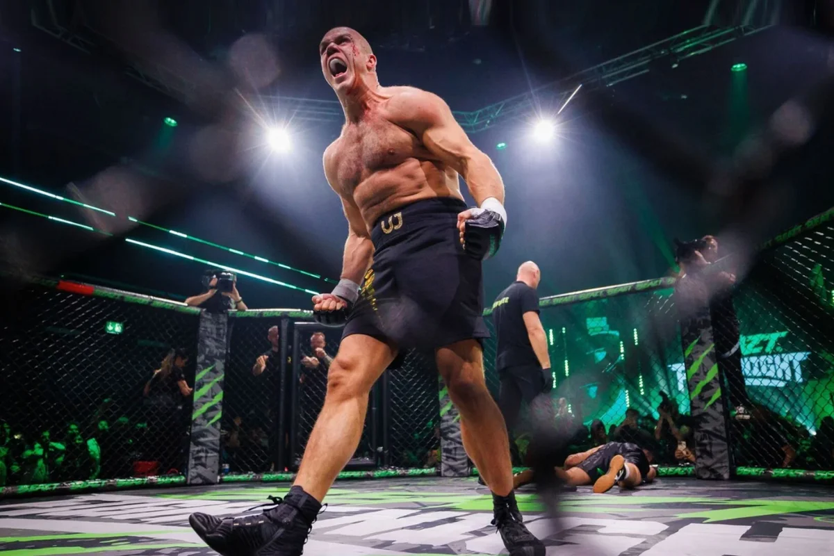 Badr Hari approves as Touchassie claims GLORY light heavyweight title ...